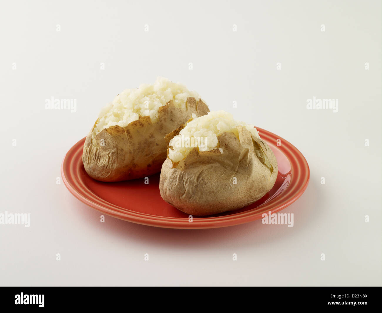 Two baked potatoes Stock Photo - Alamy