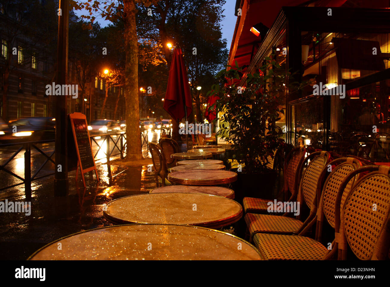cafe in paris at evening, tables are wet after rain Stock Photo - Alamy
