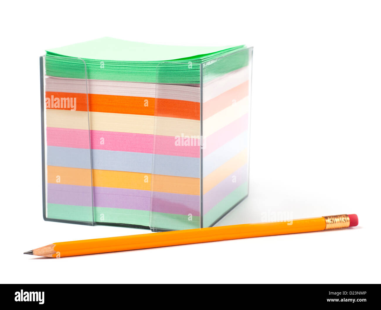 Container with note papers in different colors on white background ...