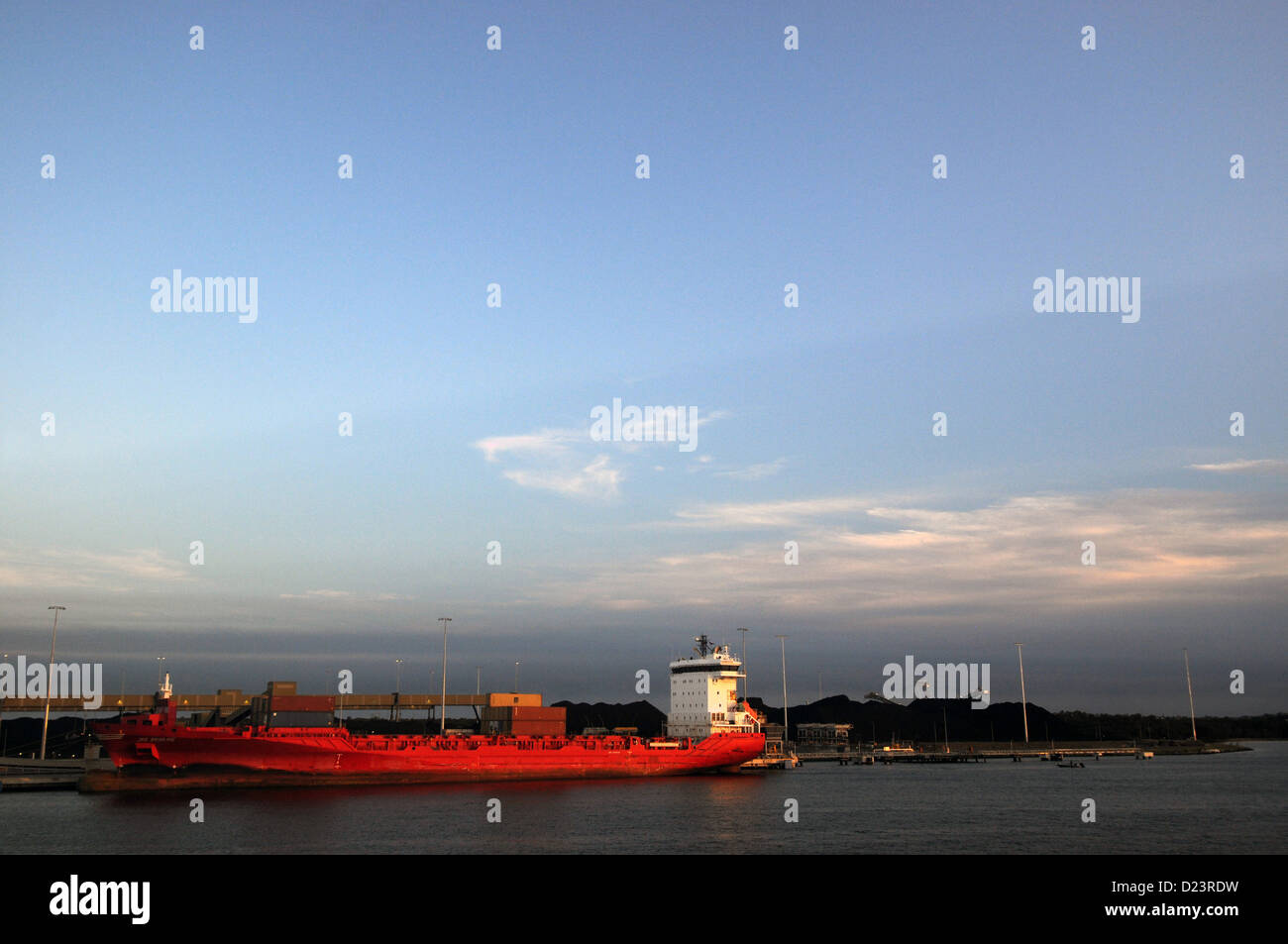 Container ship and huge heaps of coal awaiting export, Brisbane Port ...