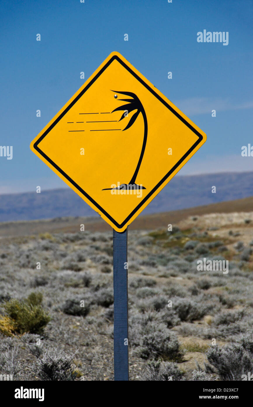 Road sign warning of strong wind, Patagonia, Argentina Stock Photo - Alamy