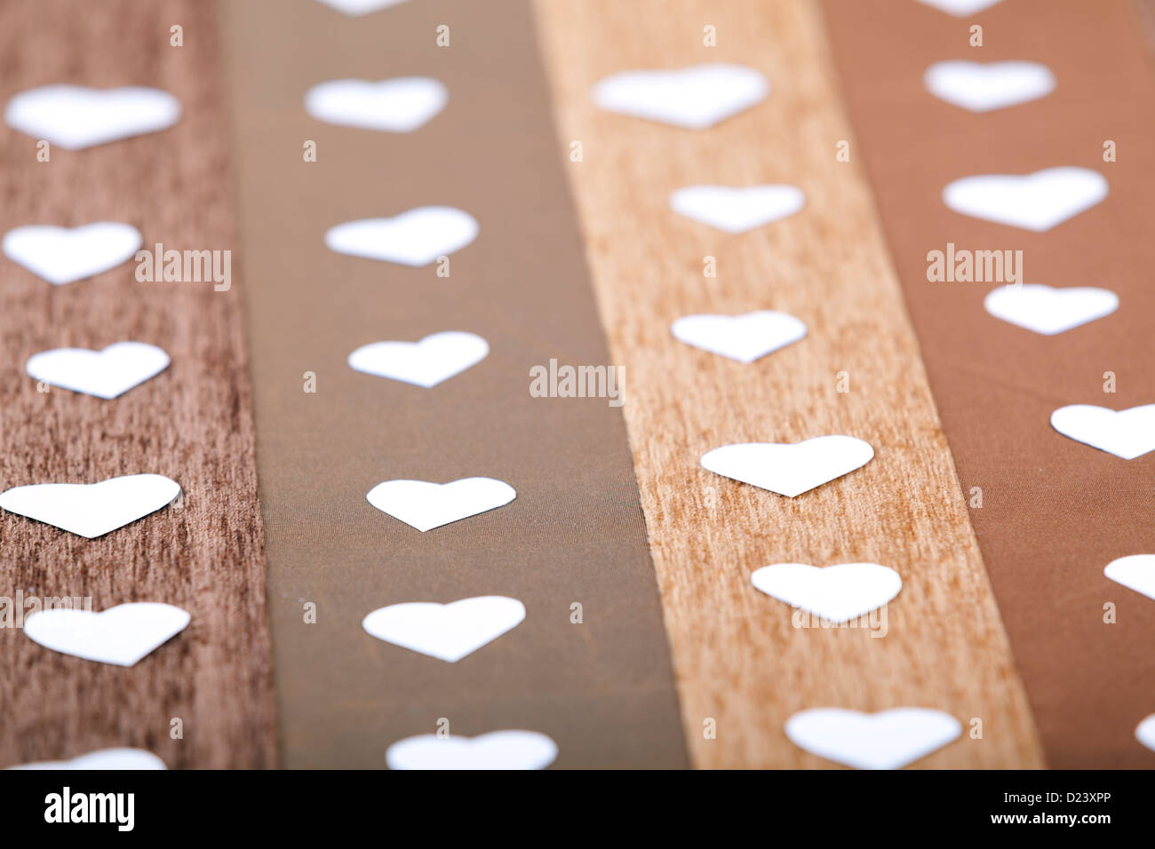 Heart shape papper cuts on a background studio shot Stock Photo - Alamy