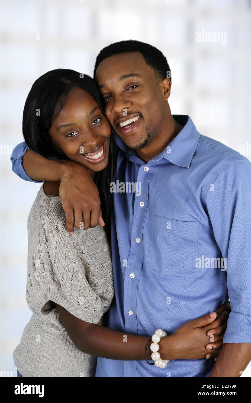 Man and woman posing together inside their home Stock Photo - Alamy
