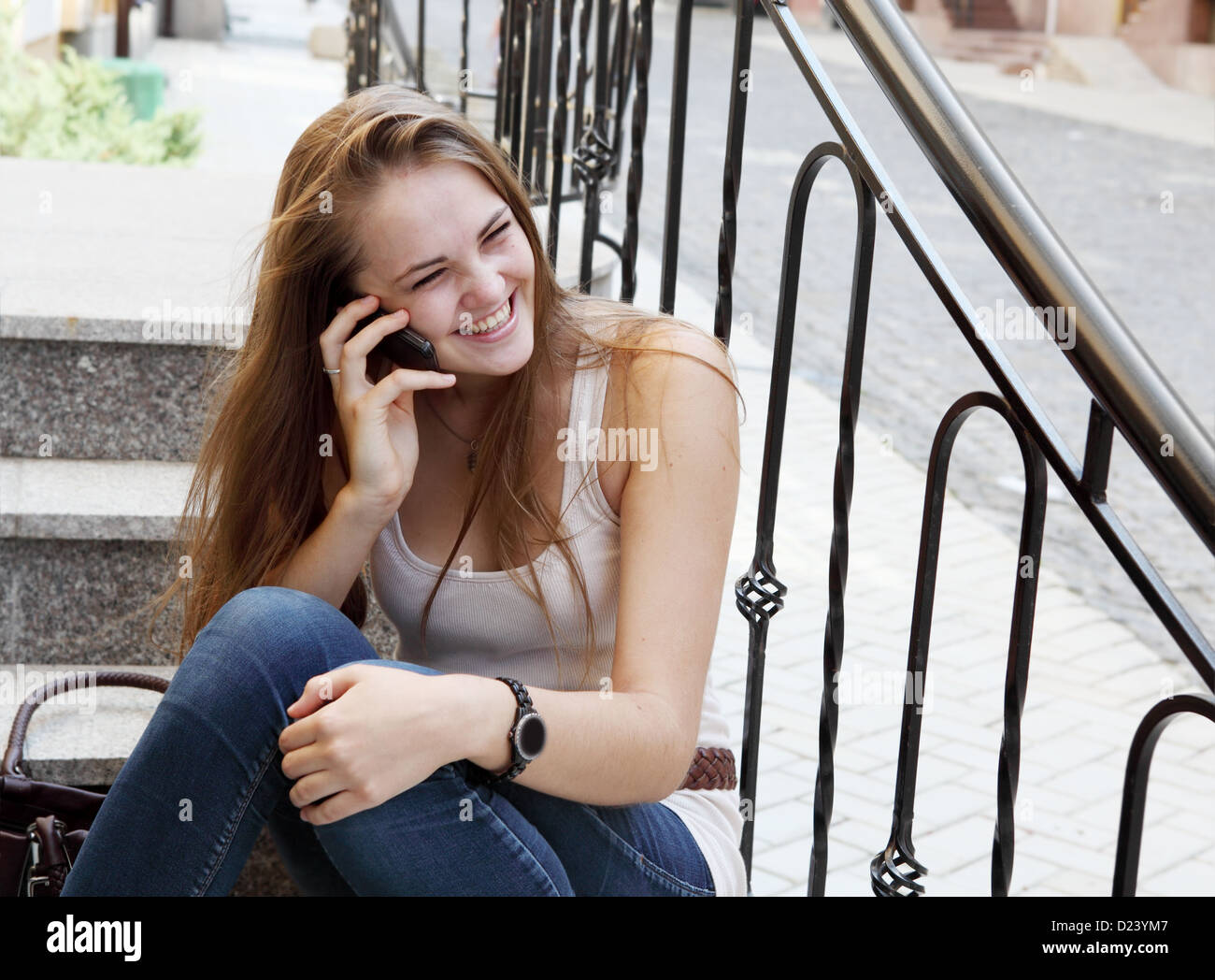 Laughing Woman Calling by Phone Outdoors Urban Scene Stock Photo - Alamy