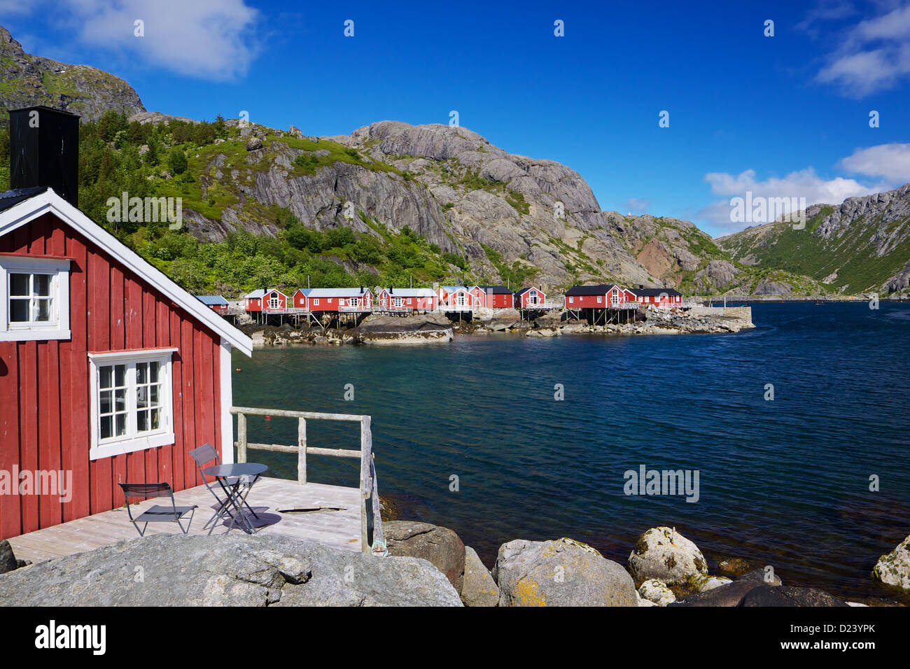 Typical red rorbu fishing huts in village of Nusfjord, unesco heritage ...