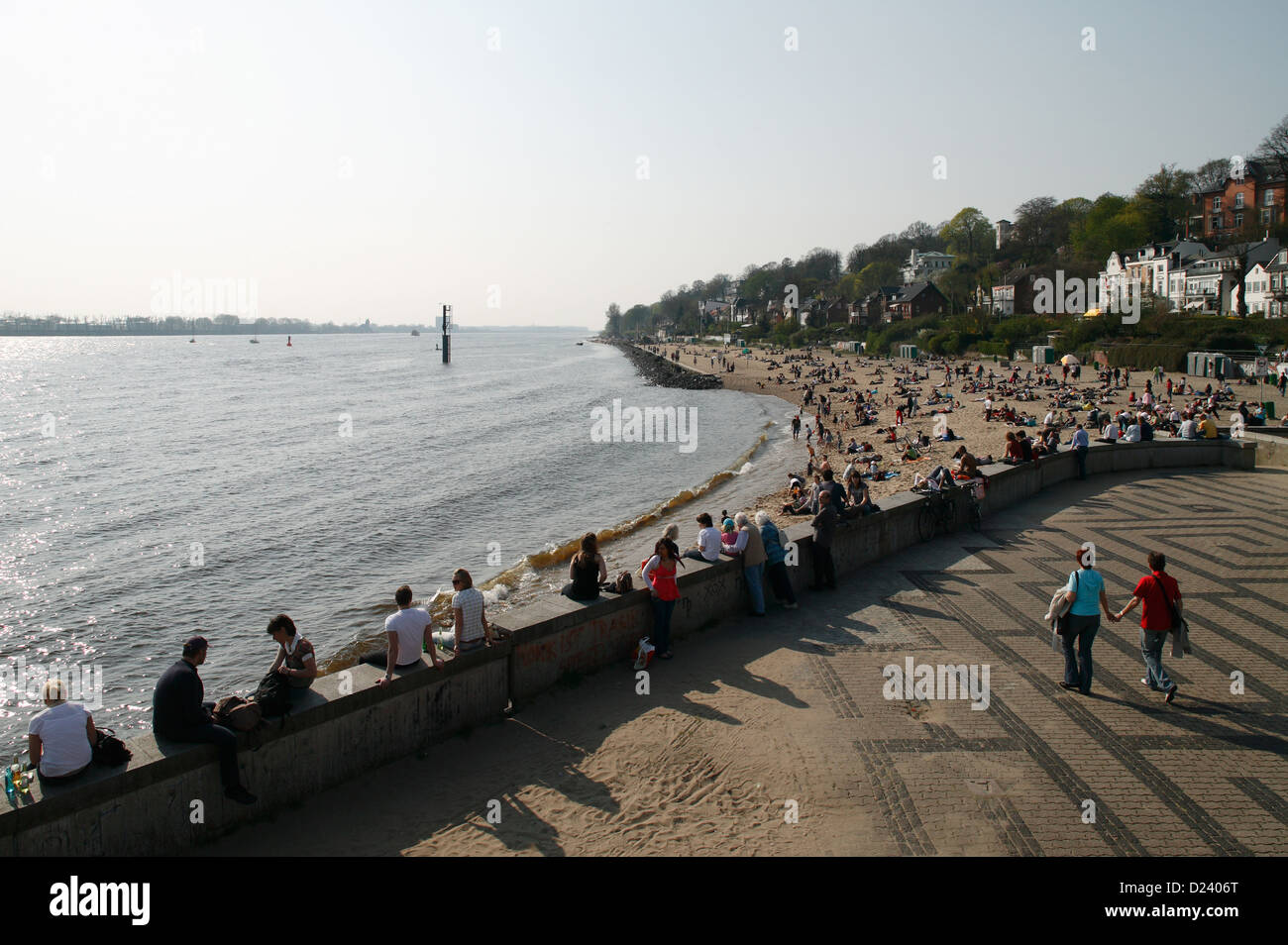 Hamburg, Germany, people sitting in the spring at the River Elbe in ...