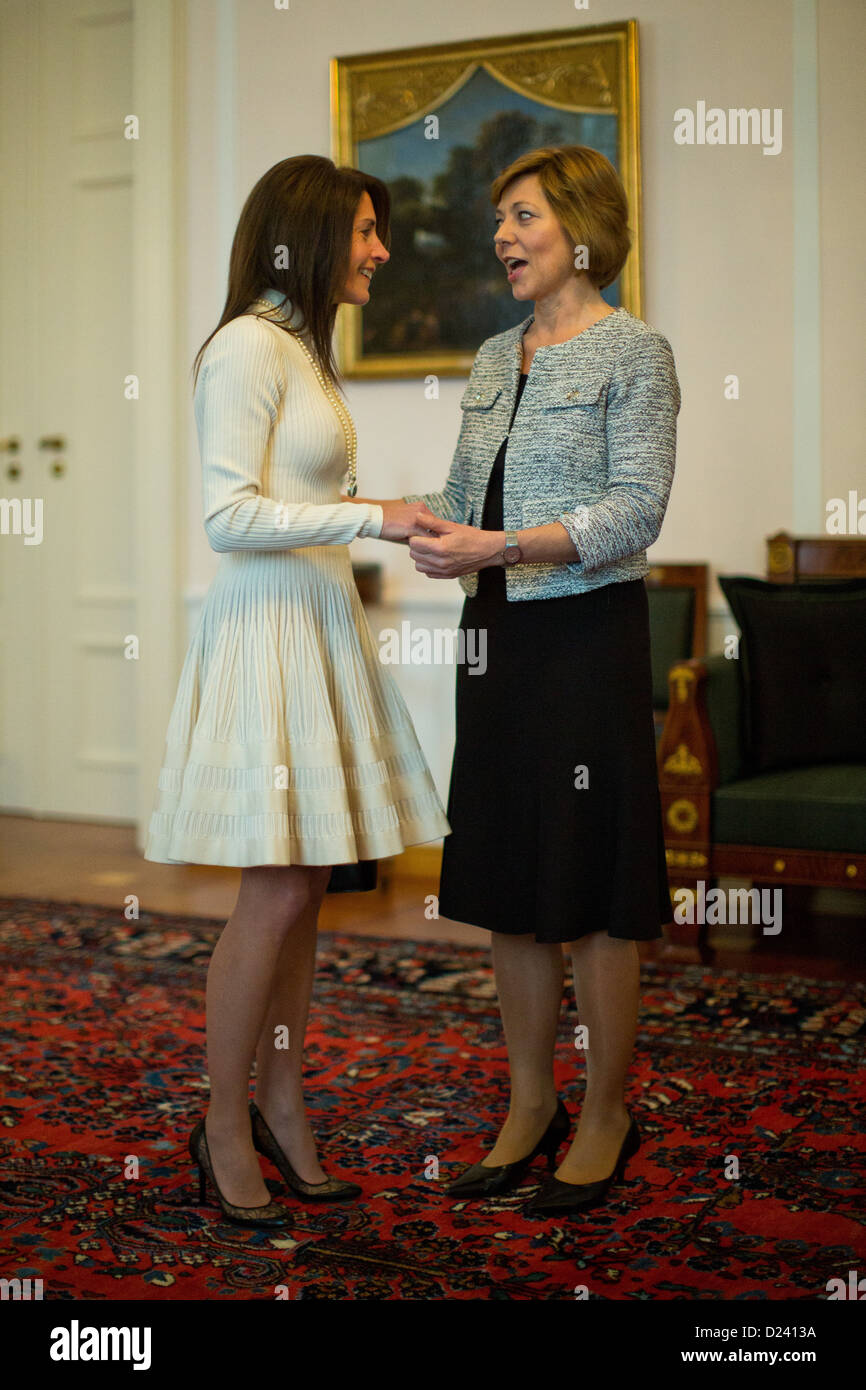 Daniela Schadt (R), partner of German President Joachim Gauck, chats ...