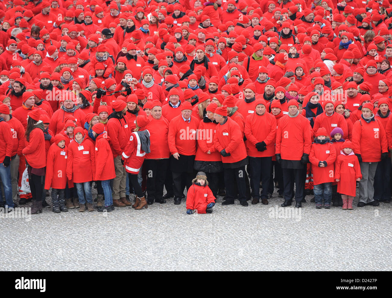 1,800 members of the German Red Cross (DRK) dressed in red form a large ...