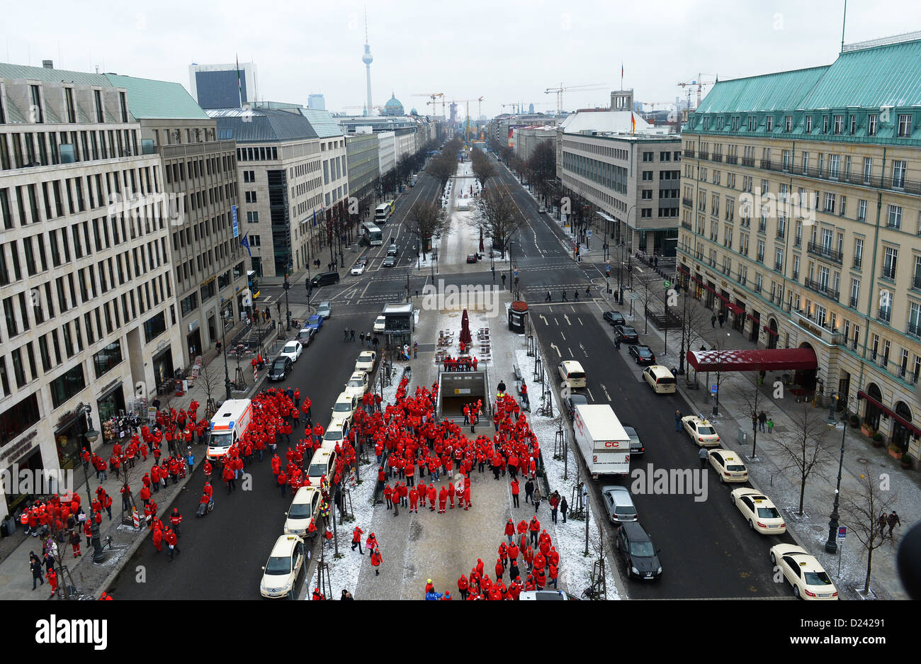 1,800 members of the German Red Cross (DRK) dressed in red form a large ...