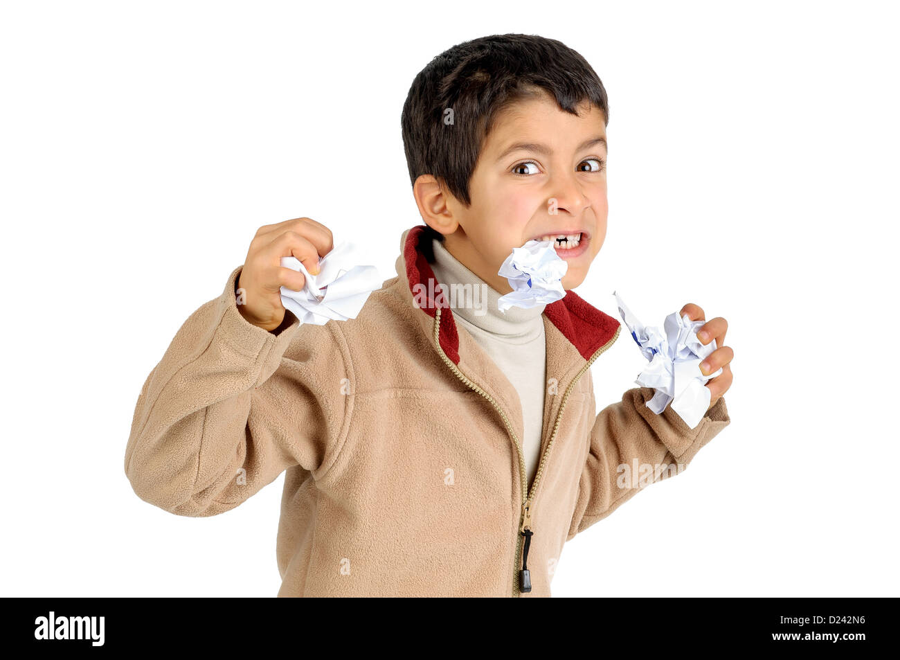 Stressed young boy chewing his homework Stock Photo - Alamy