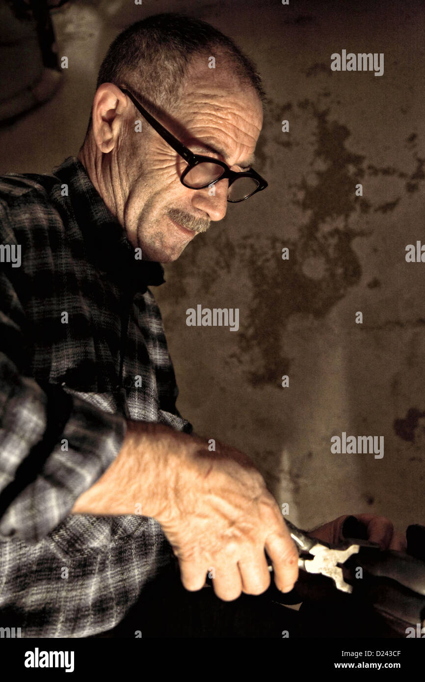 cobbler at work with old tools Stock Photo - Alamy