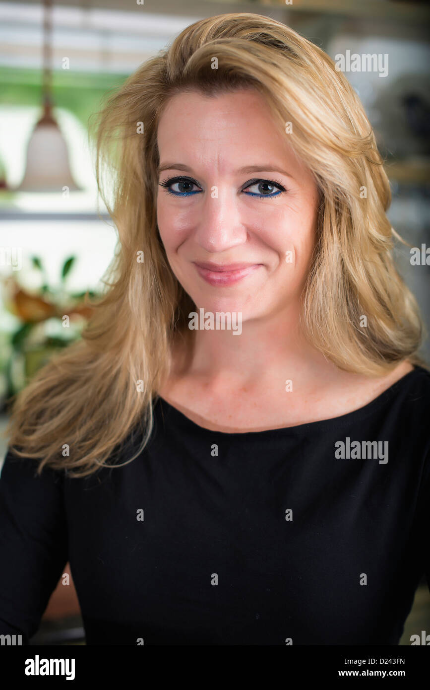 USA, Texas, Mid adult woman smiling, portrait Stock Photo - Alamy