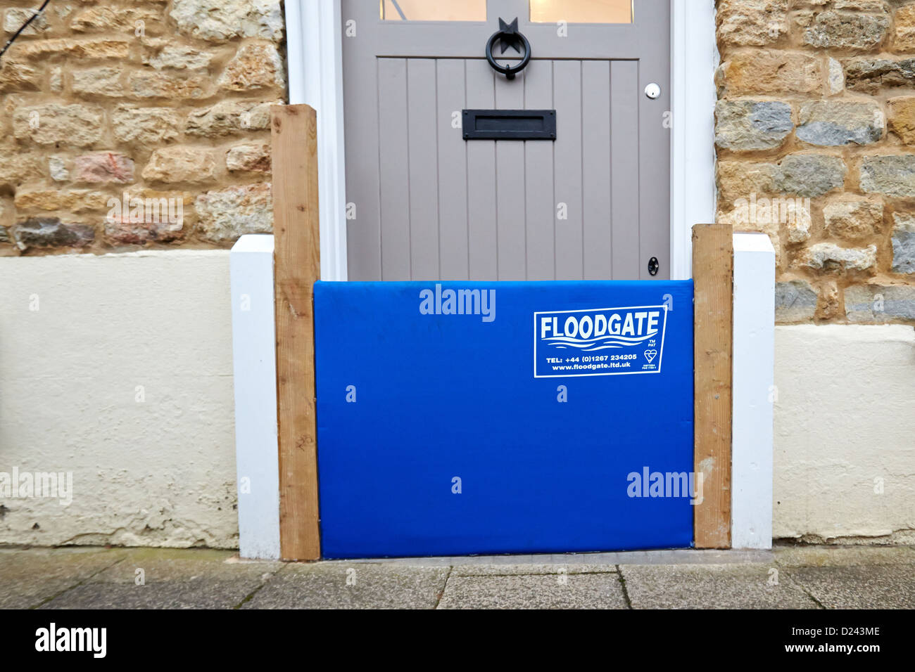 Floodgate flood defence panel installed in a doorway in Buckingham ...