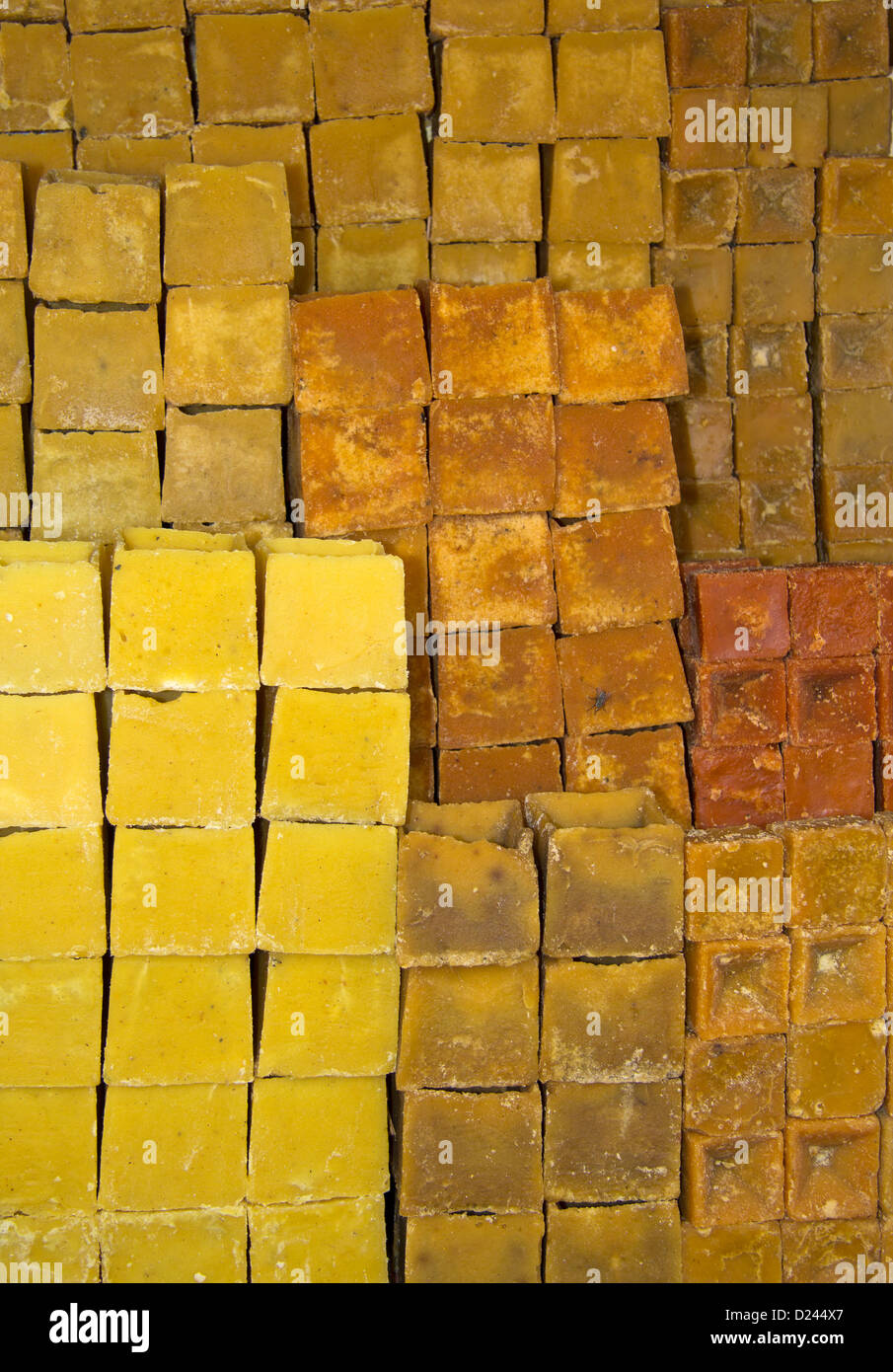 JAGGERY THE UNREFINED CANE SUGAR BRICKS OF INDIA Stock Photo - Alamy