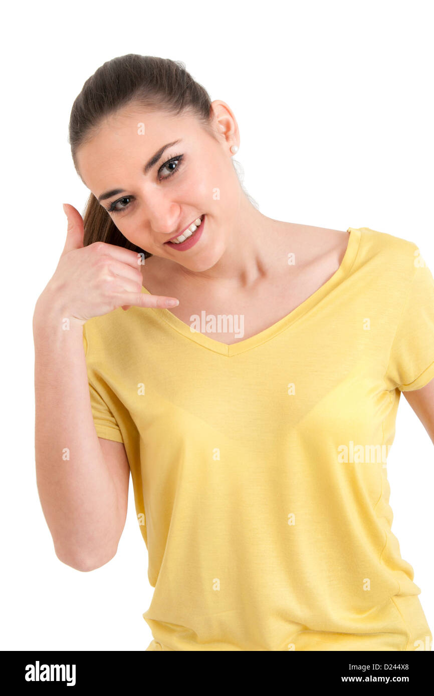 Portrait of beautiful young woman making call me gesture on white ...