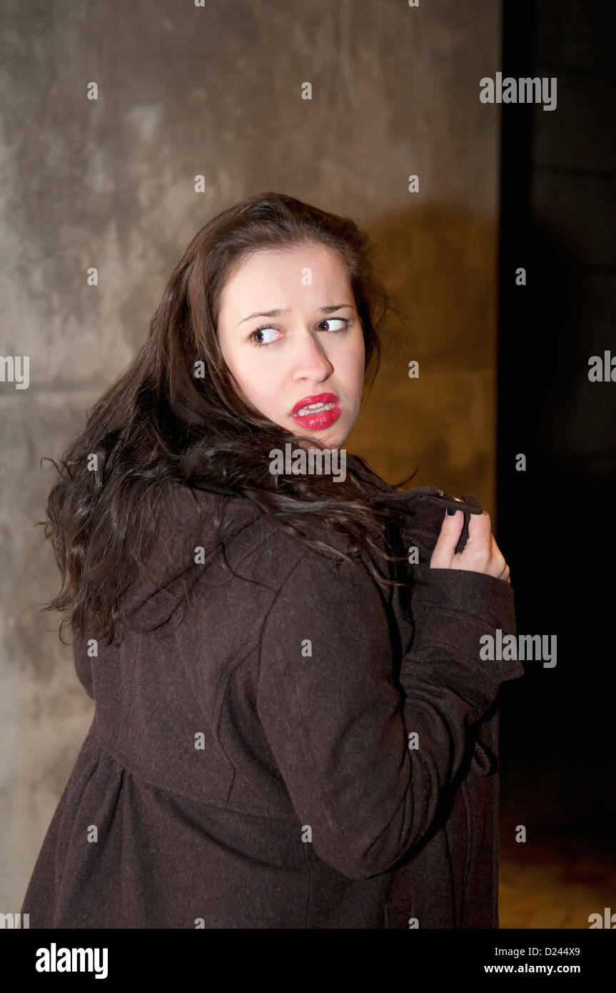 Germany, Berlin, Young woman running through street Stock Photo - Alamy