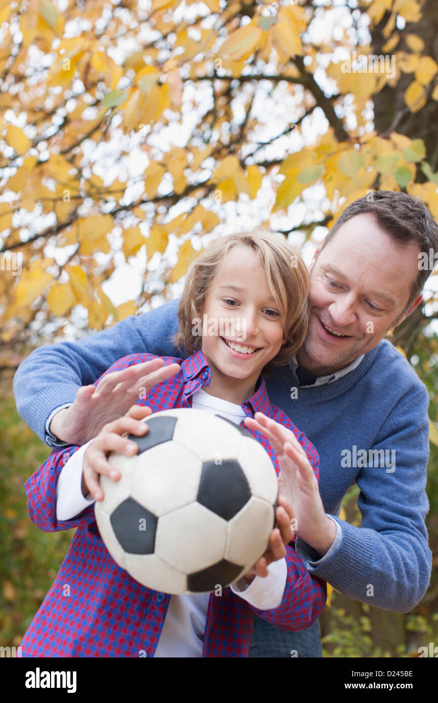 Father Son On Shoulders Football High Resolution Stock Photography and ...