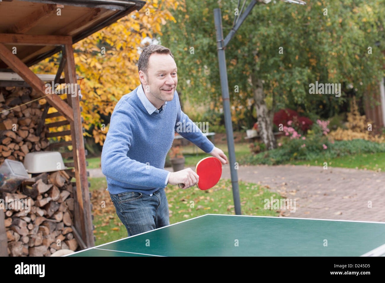 Germany, Leipzig, Mature man playing table tennis Stock Photo - Alamy