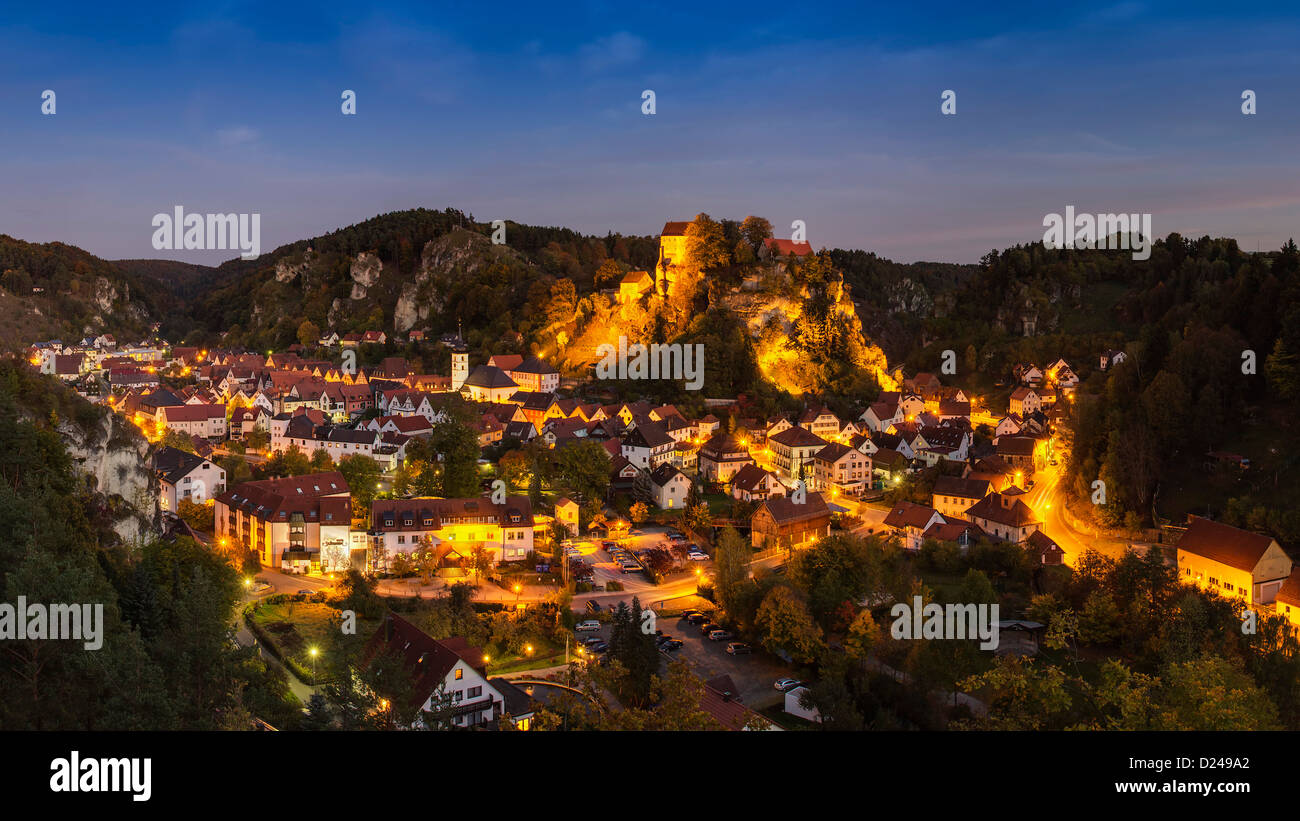 Germany, Bavaria, View of Pottenstein castle on top of mountain with ...