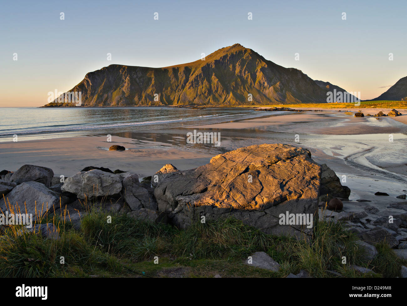 The beach at Skagen with the shapely peak of Hustind, Flakstad, Lofoten ...