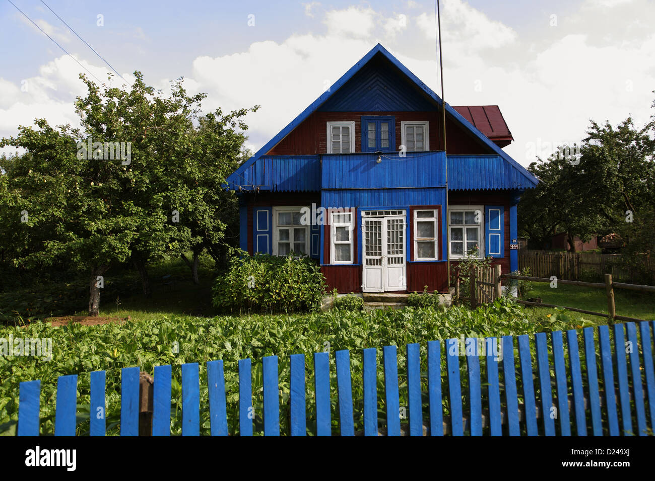 Skrybaucy, Belarus, typical wooden house in the country Stock Photo - Alamy