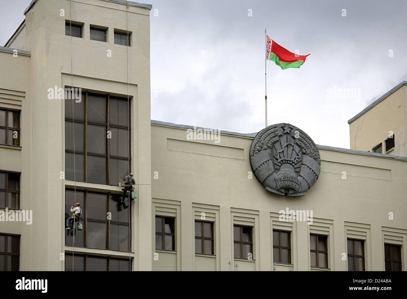 Minsk, Belarus, the Government House with Belarusian flag and coat of ...