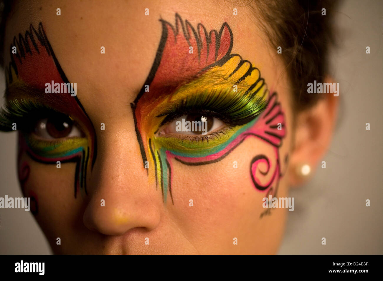 A model poses during a body painting session with make-up artist Erika ...