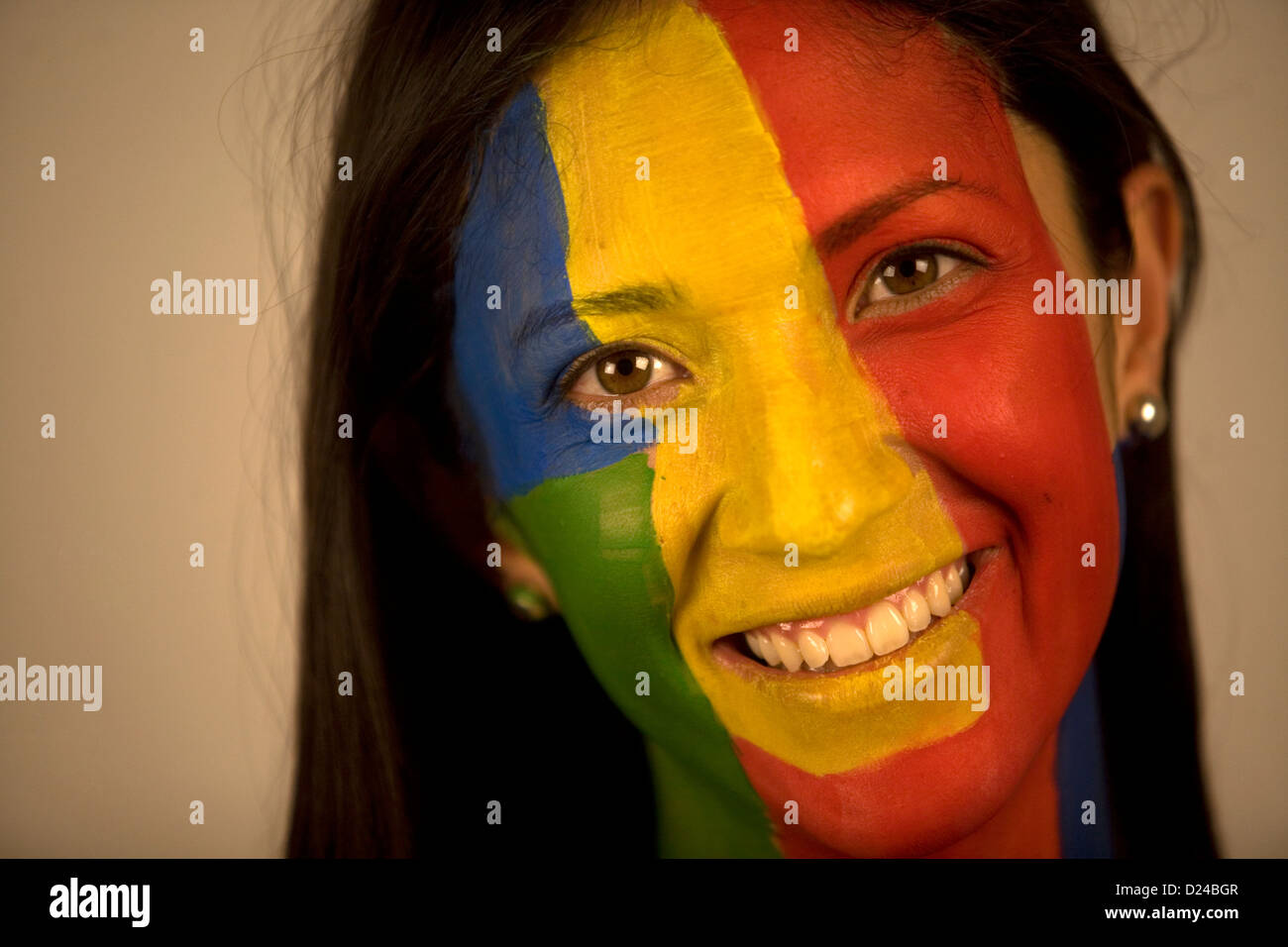 A model smiles during a body painting session with make-up artist Erika ...