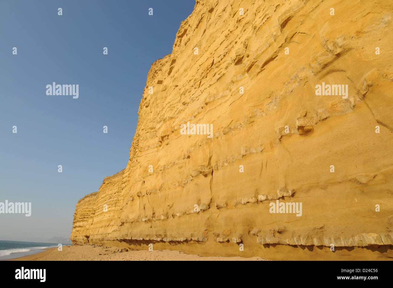 Cliff over beach Stock Photo - Alamy
