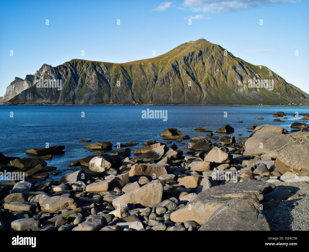 The beach at Skagen with the shapely peak of Hustind, Flakstad, Lofoten ...
