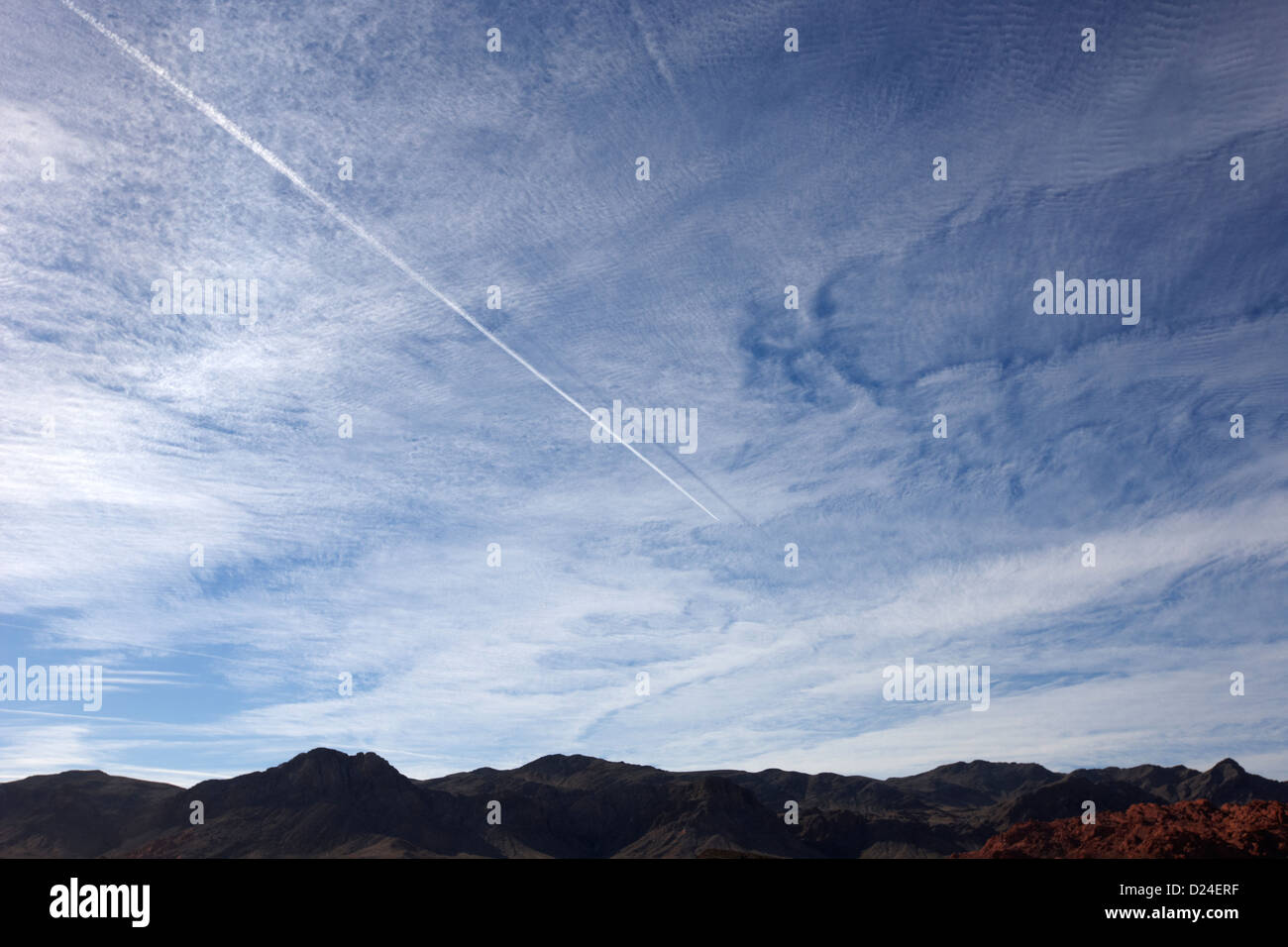 aircraft contrail with shadow on lower cloud nevada usa Stock Photo - Alamy