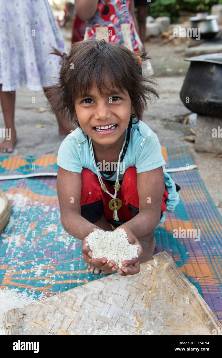 Child pouring rice hi-res stock photography and images - Alamy