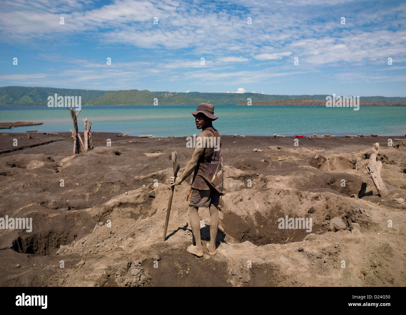 Man Digging To Find Megapode Birds Eggs In Tavurvur Volcano Sands ...