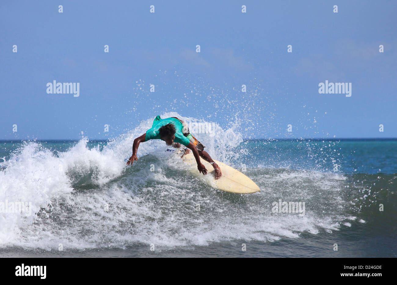 Man-surfer in ocean. Bali. Indonesia Stock Photo - Alamy