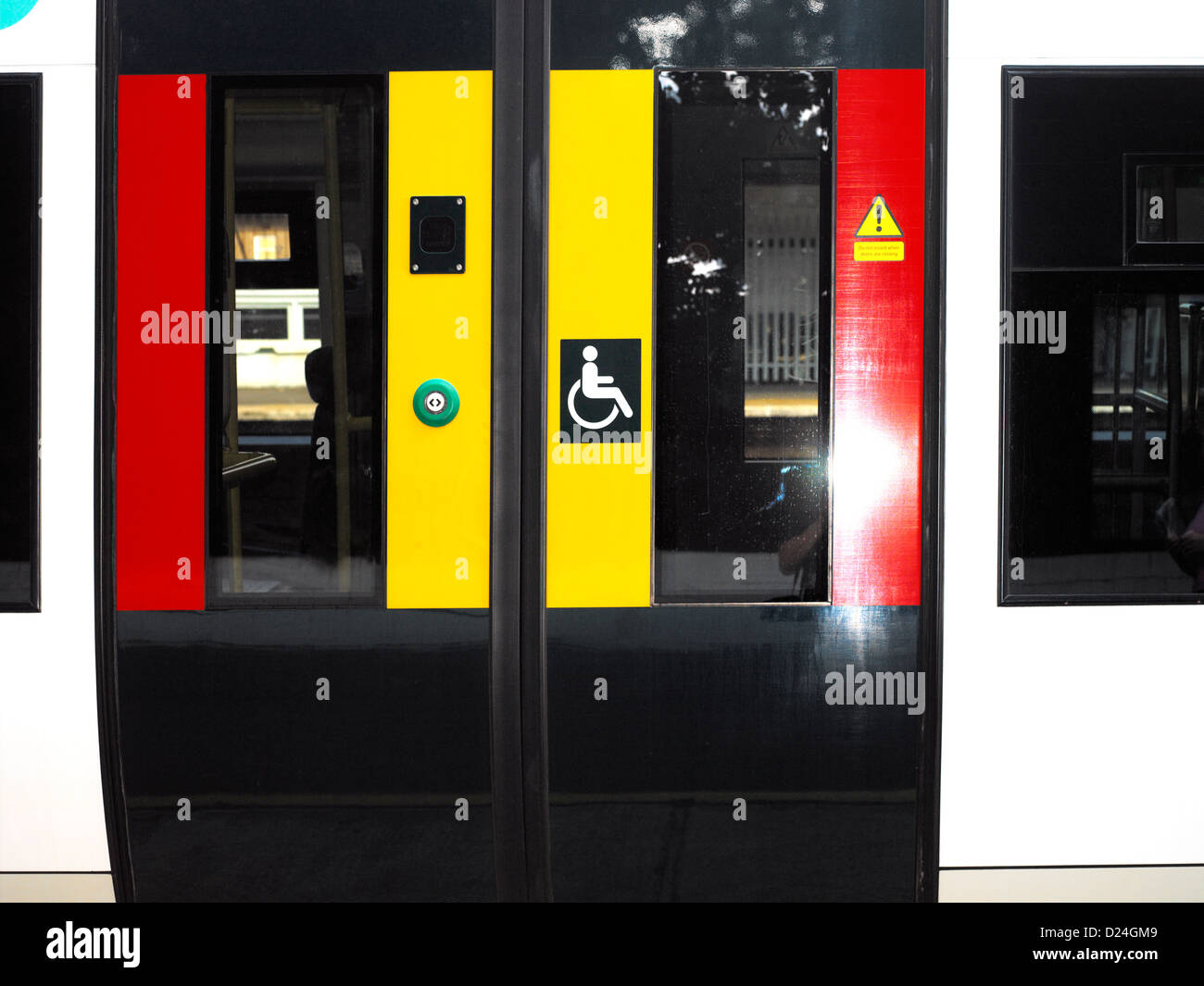 Disabled Door sign on Commuter Train in London England Stock Photo - Alamy