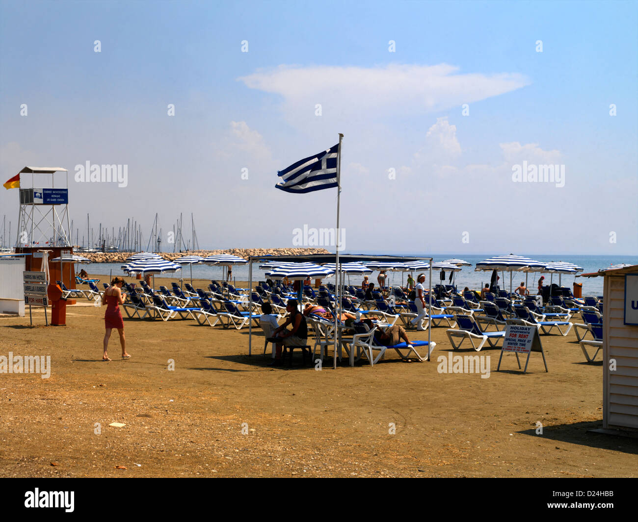 Sun blue flag beach hi-res stock photography and images - Alamy