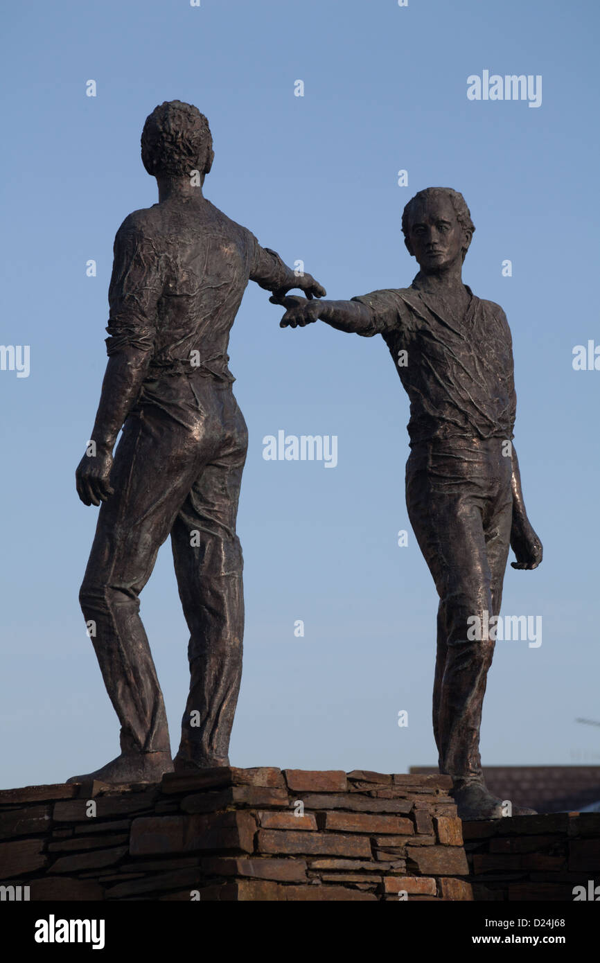 Hands across the divide bronze sculpture by Maurice Harron Derry Londonderry Northern Ireland ...