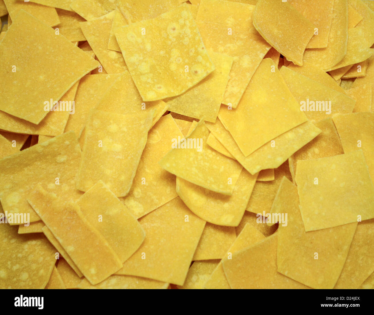 Square shaped pasta background Stock Photo - Alamy