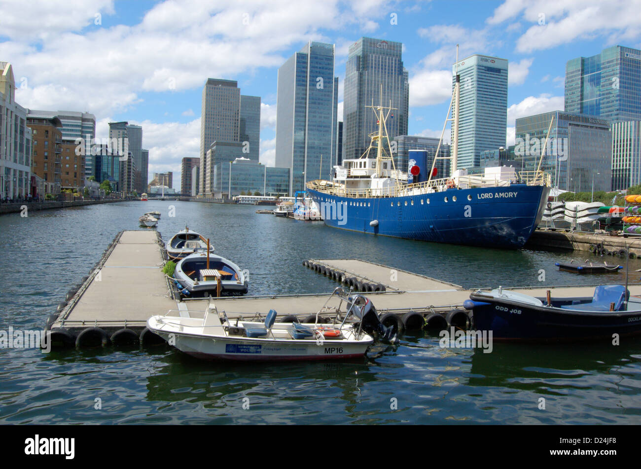 Canary Wharf skyline and boats in a dock in London, England Stock Photo ...