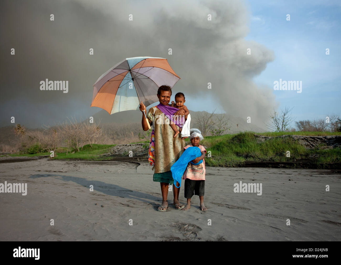 Family Under A Volcanic Eruption In Tavurvur Volcano, Rabaul, New ...