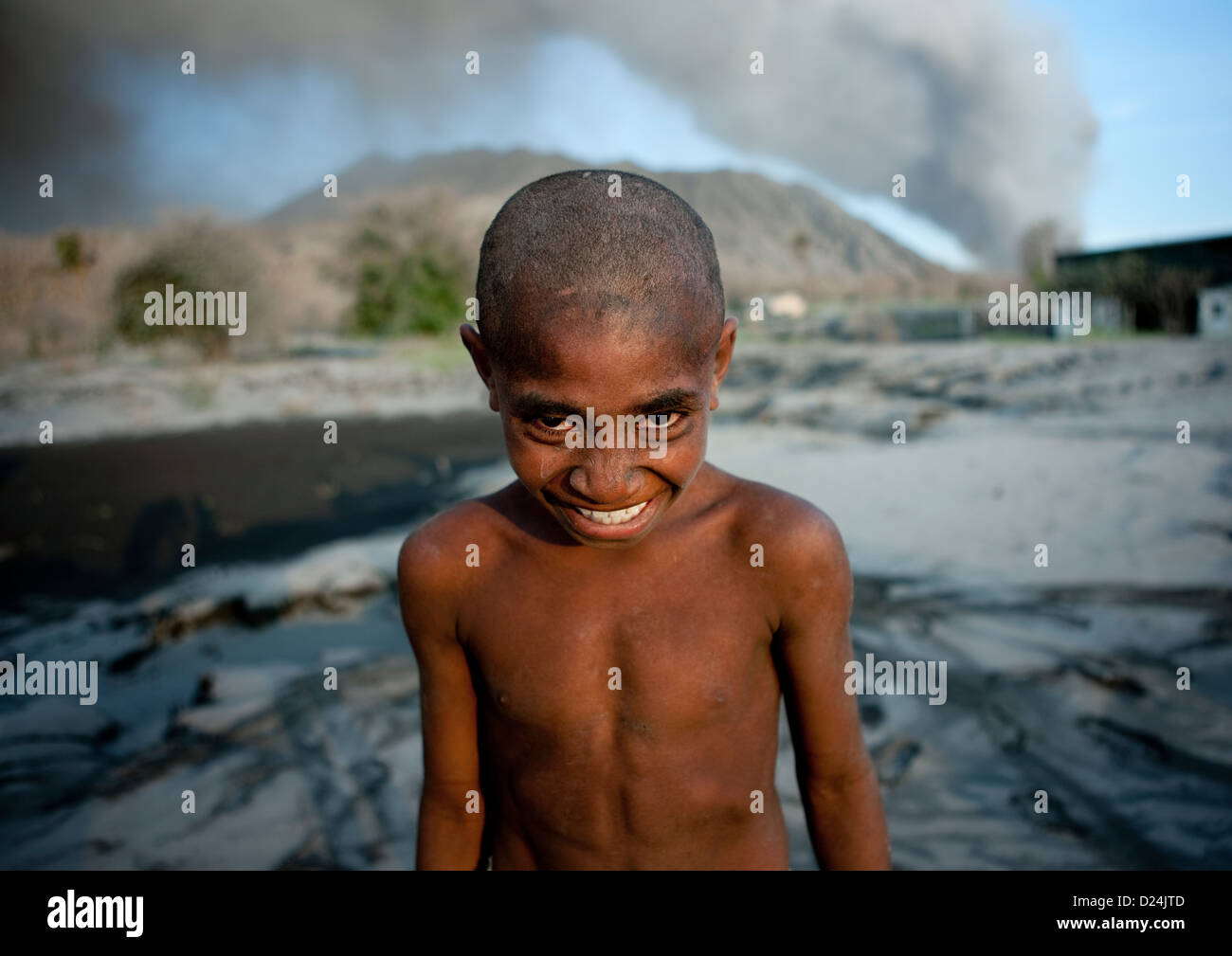 Kid Under A Volcanic Eruption In Tavurvur Volcano, Rabaul, New Britain ...