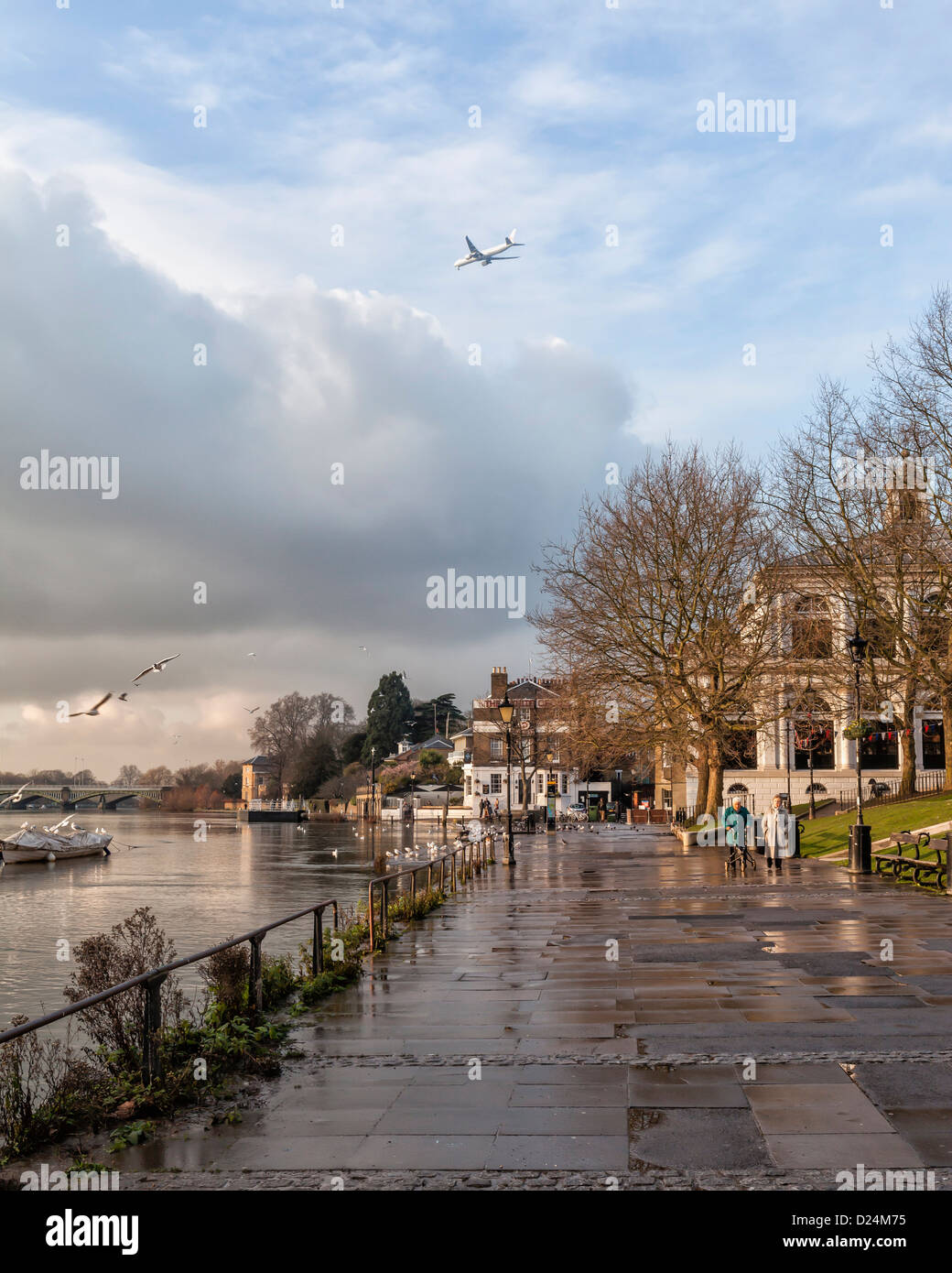 Flight path - Plane flying over Thames riverside - Richmond upon Thames ...
