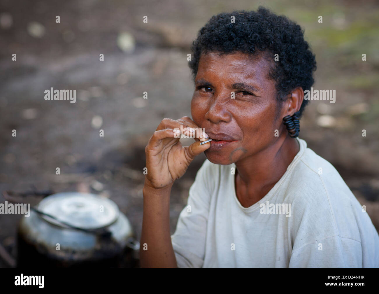 Woman Wearing Ear Rings Made With Turtle Shells, Trobriand Island ...