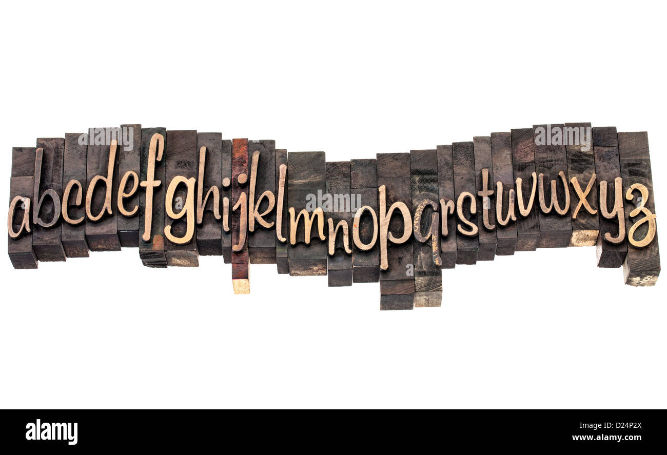 English alphabet in wavy row - letterpress wood type printing blocks, a ...