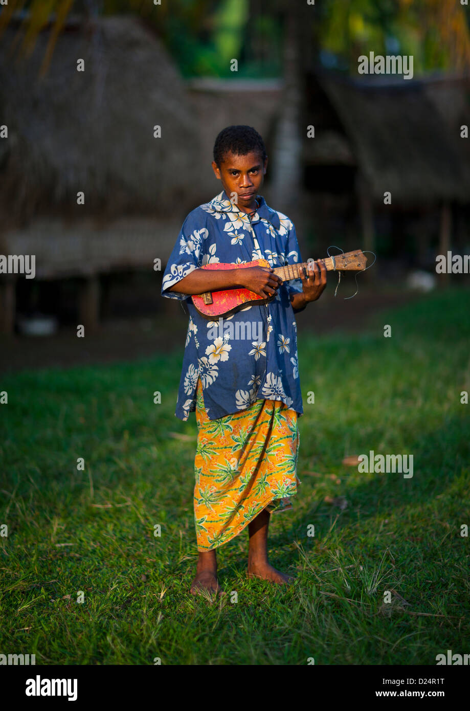 Islander Girl Playing Guitar, Trobriand Island, Papua New Guinea Stock ...