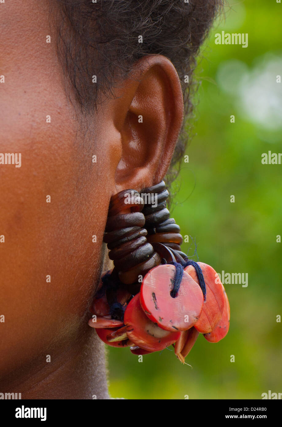 Little Girl Wearing Ear Rings Made With Turtle Shells, Trobriand Island ...