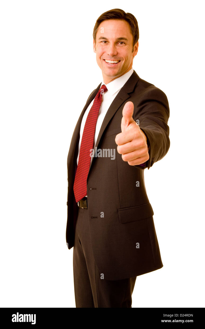 Businessman wearing a suit giving a thumbs up isolated on white Stock ...