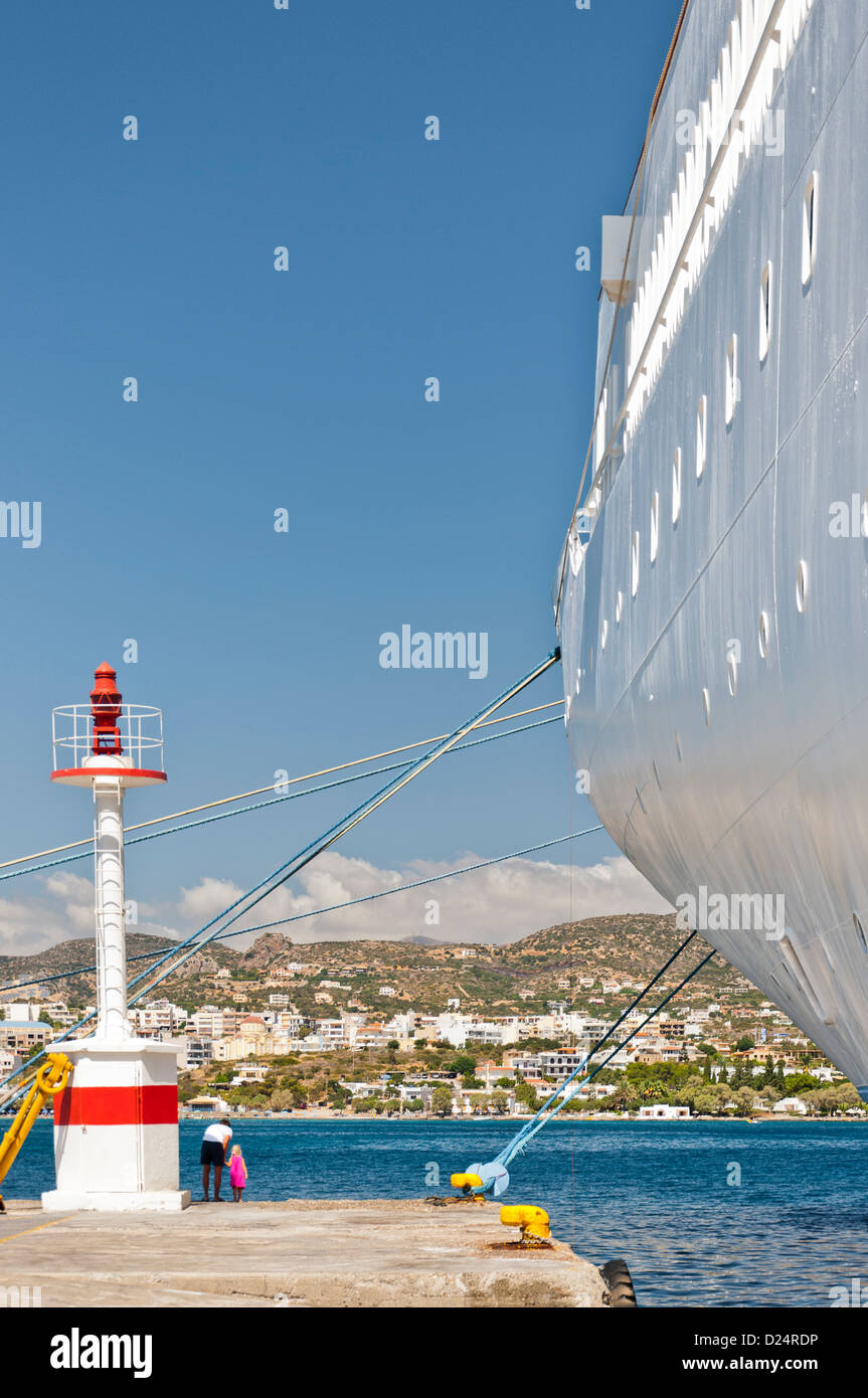 Cruise ship and lighthouse Stock Photo - Alamy