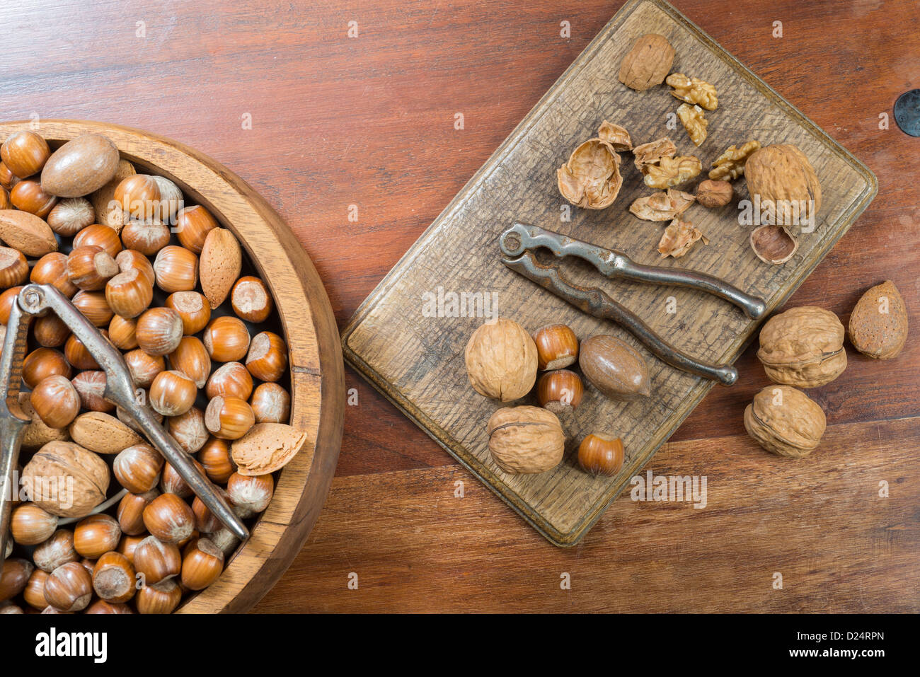 Edible nuts and nutcrackers on a table at home in a christmas setting ...