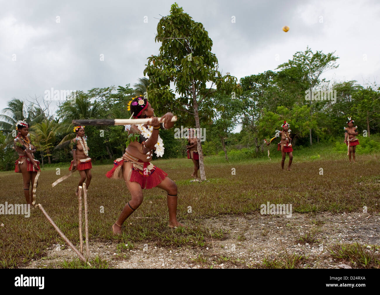 Girls Playing Cricket In Trobriand Island, Papua New Guinea Stock Photo ...